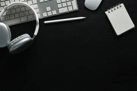 Premium Photo Modern Workspace With Headphone Notepad Keyboard And