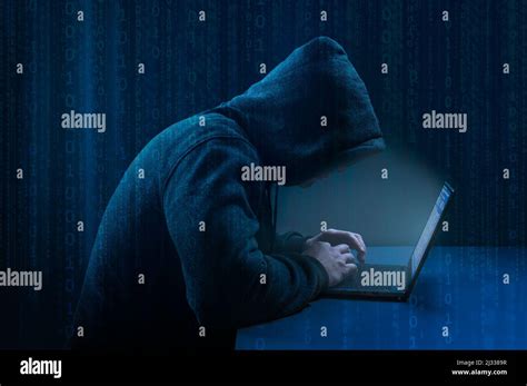 Hacker Hacker Using Laptop On Dark Binary Code Digital Background