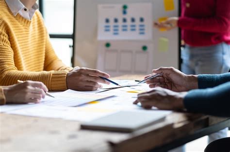 Premium Photo Ux Ui Designers Collaborate To Design User Interfaces For Smartphone Apps Based