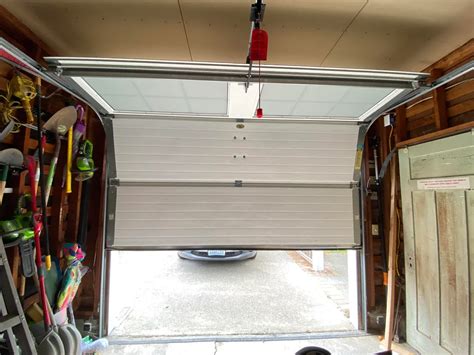 How To Fix A Garage Door That Gets Stuck Going Up