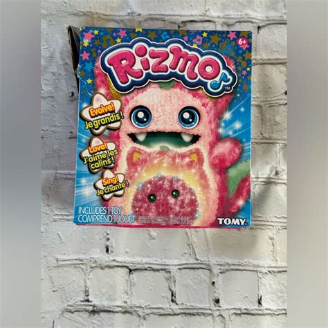 Tomy Toys Rizmo Evolving Musical Friend Interactive Plush Toy With