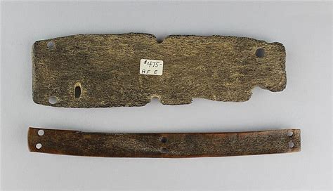 Lot TWO PREHISTORIC TYPE OBJECTS WHALEBONE FRAGMENT TOGETHER WITH