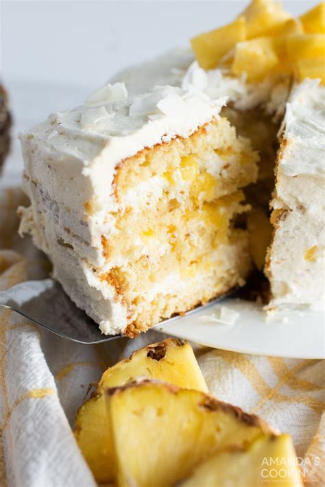 Pineapple Cake Starts With A White Cake Mix Layered With Cream Cheese