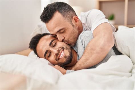 Men Hugging In Bed