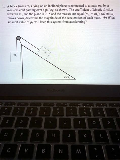 solved a block mass m lying on an inclined plane is connected to