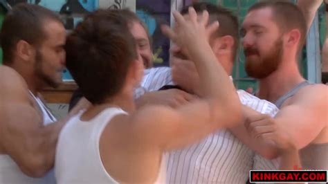 Leon Fox Held Down As The Guys Edge His Hard Cock With Foot Jobs