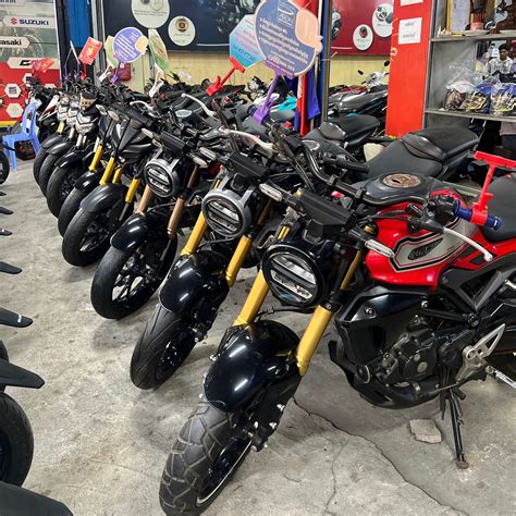 វិថីម៉ូតូបង់រំលស់ Added A New Photo វិថីម៉ូតូបង់រំលស់