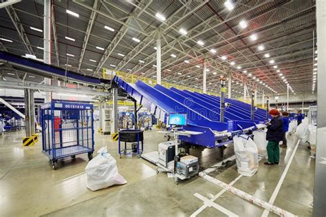 Women Separate Parcels In Automated Sorting Editorial Photo Image Of