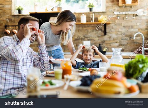 Happy Mother Serving Food Her Family Stock Photo 2193653665 | Shutterstock