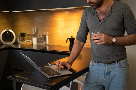 Free Photo Side View Man Working On Laptop