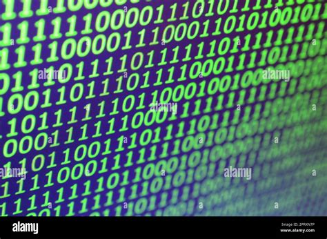 Macro Shot Of Binary Code On The Monitor Of An Office Computer The Concept Of The Programmers