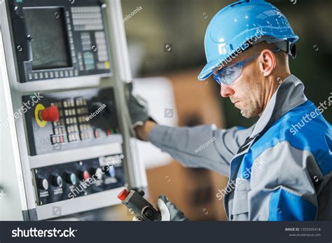 Caucasian Cnc Machine Operator Wearing Blue Stock Photo Edit Now