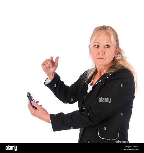 Adult Woman Angry About A Message On Her Cellphone Looking Back Over