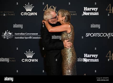 Former World Champion Surfer Layne Beachley Kisses Husband Kirk