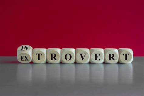 Premium Photo Introvert Or Extrovert Symbol Turned A Cube And Changed The Word Introvert To