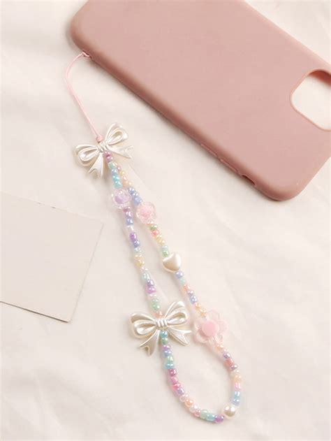 حبل هاتف مزخرف بفيونكة خرز