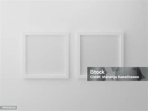 스튜디오에서 흰색 벽에 격리 빈 사각형 빈 사진 프레임 제품 개체에 대한 3d 렌더링 설계 개념입니다 모형 및 배치 이미지에 대한 회색 배경 텍스처에 매달려 있는 두 개의