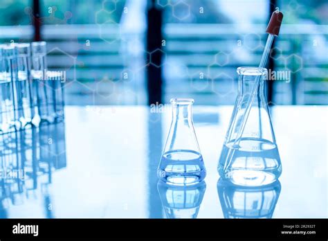 Chemistry Experiment Concept In Science Laboratory Two Science Flasks Of Different Sizes Contain
