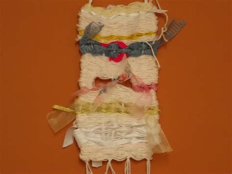 A Peg Loom Weaving With Yarn Lace And Ribbons Loom Weaving Peg Loom Loom