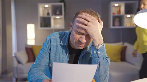 Working Class Man Struggles With Debt The Man Tries To Deal With His Debts And Fails And His