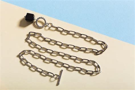 Premium Photo Close Up Of Chain On Table