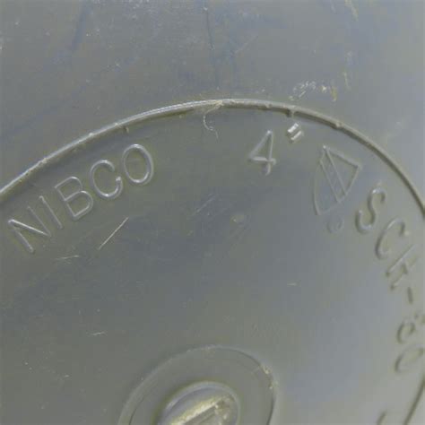 Nibco 4 Slip Socket Cap SCH80 Gray PVCI Pipe Fitting Bullseye Industrial Sales