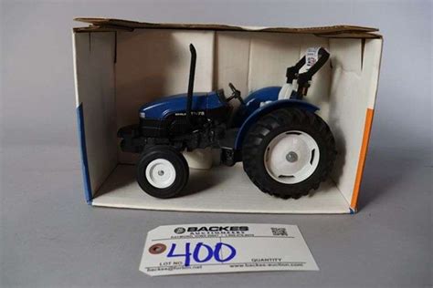 Jle New Holland Tn75 Tractor With Rollbar Die Cast With Box 1 16 Scale Backes Commercial