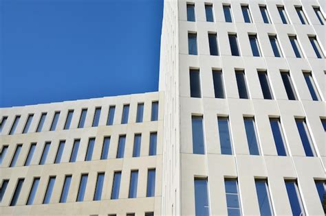 Premium Photo Modern Office Building Detail Perspective View Of Geometric Angular Concrete Windows