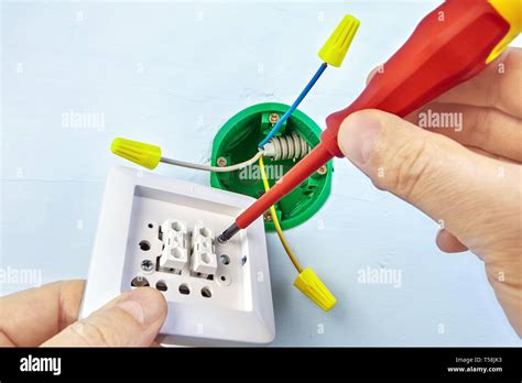 Mounting Of New Button For Double Light Switch With Help Of Screwdriver Electrical Work Stock