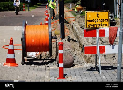 Installation And Connecting Fibre Optic Cables To Neighbouring Houses Stock Photo Alamy