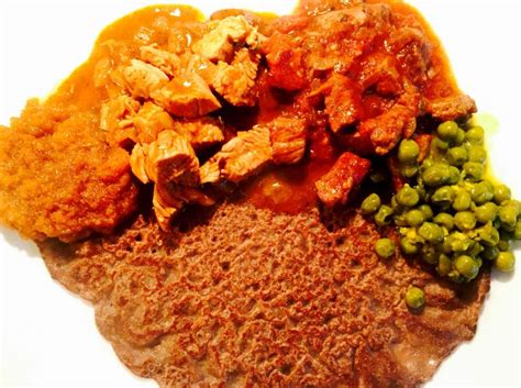 Eritrean Injera With Zigni Dorho Tsebhi Alicha And Shiro Impulsive