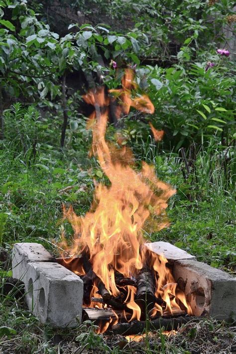 On The Street There Is A Self Made Brazier On A Lit Big Fire Stock