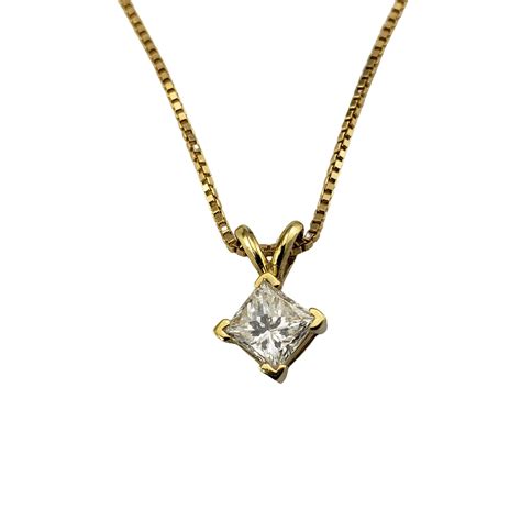 14 Karat Yellow Gold Princess Cut Amethyst Cross On Yellow Gold