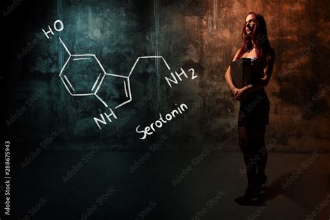 Sexy Girl Or Secretary Or Female Babe Presenting Handdrawn Chemical Formula Of Serotonin