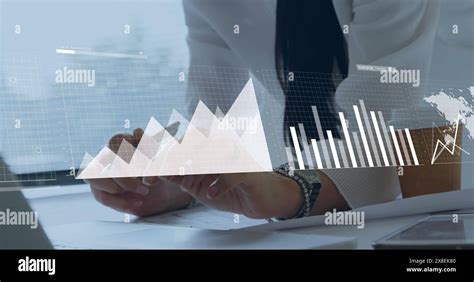 Image Of Statistical Data Processing Against Mid Section Of A Businessman Working On A Plan