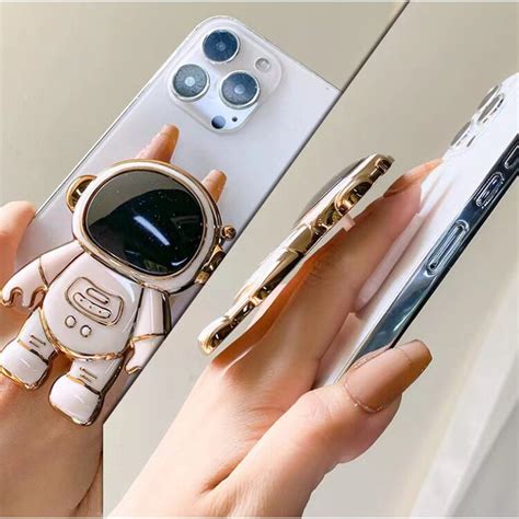 แท่นวางนักบินอวกาศ มนุษย์อวกาศ แบบพับได้ ที่จับโทรศัพท์มือถือขาตั้ง ที่ยึดฝาหลัง ที่จับเคส