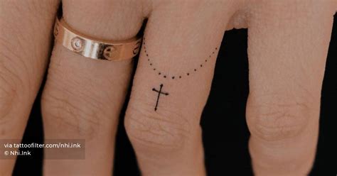 Tiny Minimalistic Rosary Ring Tattoo Located On The