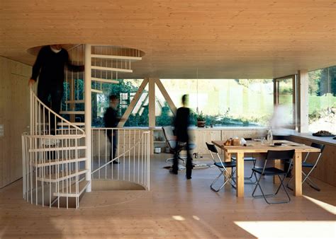 Swiss House By Pascal Flammer With Wooden Braces And A Circular Window