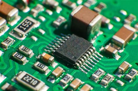Premium Photo Computer Board With Soldered Chips And Semiconductors Closeup