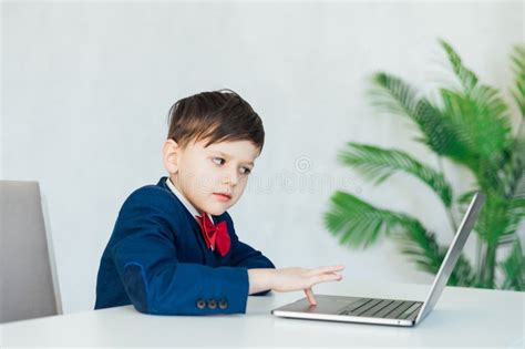 in the classroom at school at the laptop programmer at the computer