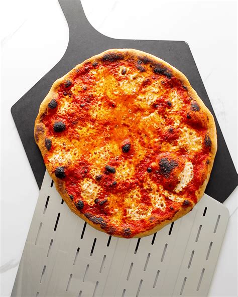 What Is A Pizza Peel How Do You Use It Thursday Night Pizza