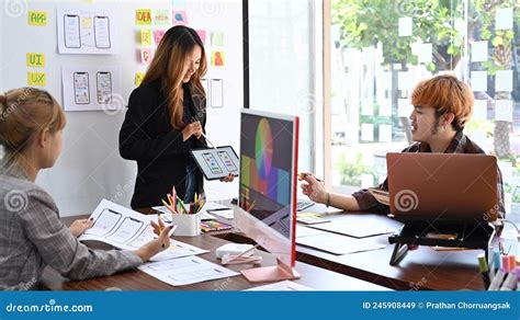 Group Of Professionals Web Developers Brainstorming And Working