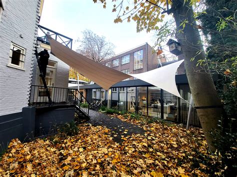 Semi Permanent Removable Shade Sail Structure For A Lanai Area Of A Modern House In Kapaʻa