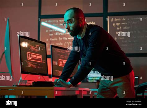 Dramatic Portrait Of Bearded Cybersecurity Expert Preventing Emergency