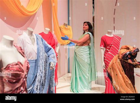 London, UK. 17th May, 2023. The Design Museum's Priya Khanchandani (curator) poses with a Rashmi ...