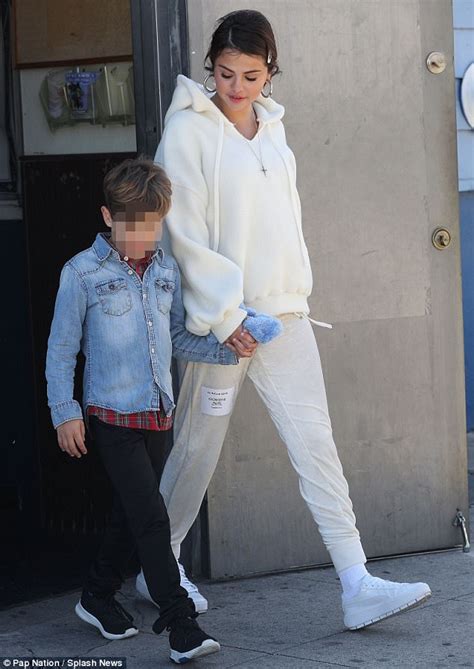 Chilling Out Selena Gomez Dons All White Tracksuit To Take Her Pals