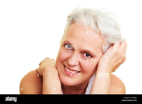Happy Senior Woman Smiling Into The Camera Stock Photo Alamy