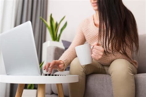 Free Photo Woman Checking Her Laptop For Sales