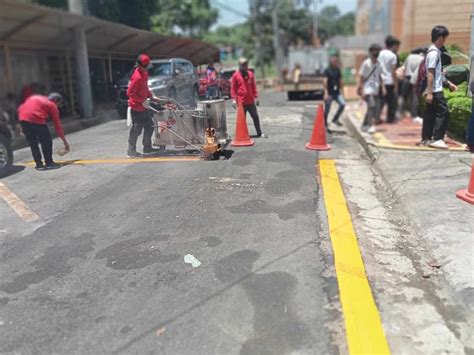 Quezon City Engineering Department Marks New Safety Lanes And In Qcu San Bartolome Campus