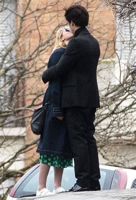 Riverdales Lili Reinhart Cole Sprouse Kiss In Paris Us Weekly